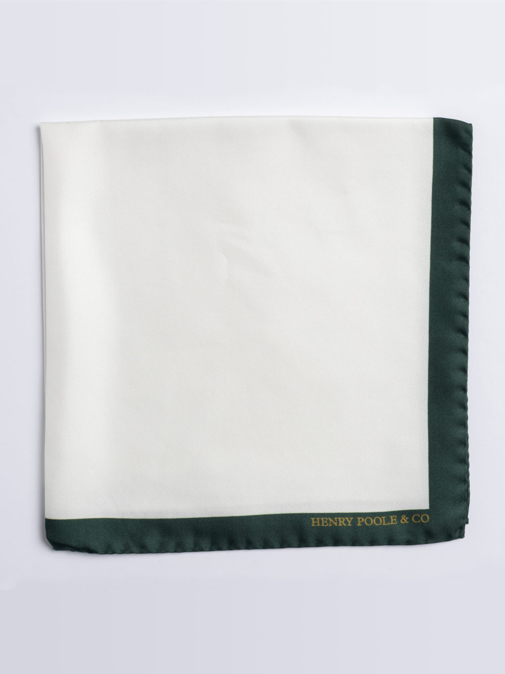 Ivory with green pocket square - Henry Poole Savile Row