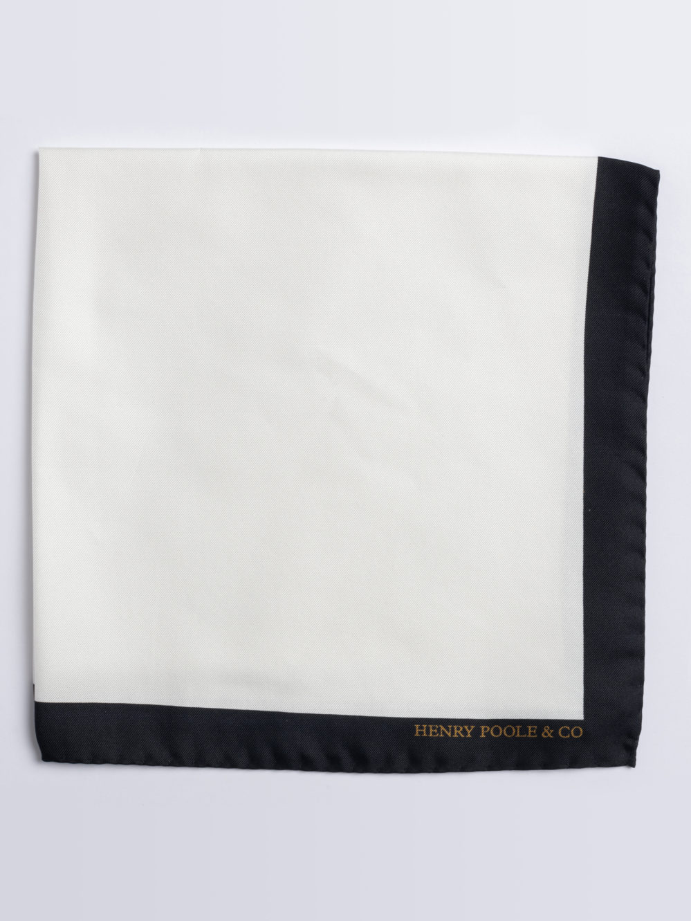 Ivory with black pocket square - Henry Poole Savile Row